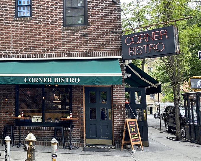 The neon glow of Corner Bistro's sign beckons hungry pilgrims like a burger lighthouse in the West Village night. New York's culinary North Star.