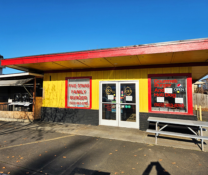 That sunshine-yellow exterior isn't just a building&mdash;it's a beacon of burger hope standing proudly against the Oregon sky, promising delicious things inside.