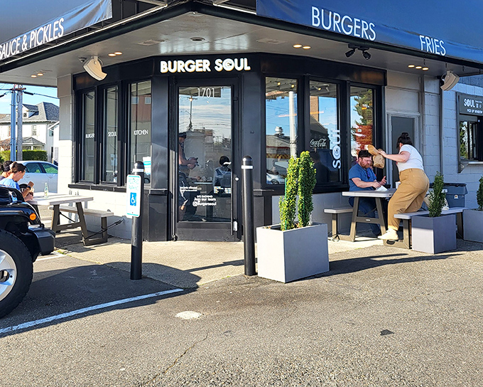The sleek black exterior of Burger Seoul stands as a beacon of burger brilliance in Tacoma, promising culinary adventures that await inside.