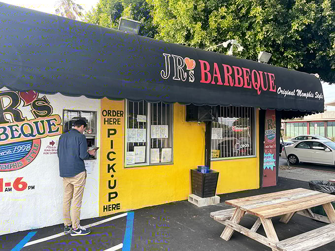 The sunshine-yellow exterior of JR's isn't just a building—it's a beacon of hope for barbecue pilgrims seeking smoky salvation in Culver City.