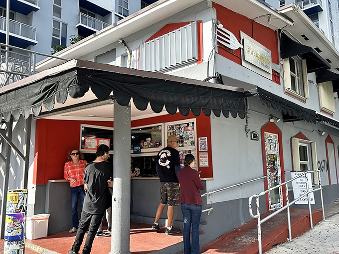 The unassuming red and white exterior of Enriqueta's might not scream "culinary landmark," but that line of hungry locals tells the real story.