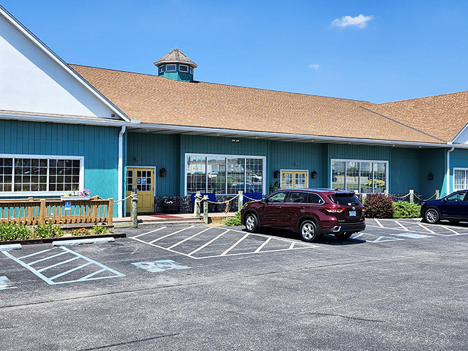 The turquoise exterior of Bay City stands like a coastal mirage in Pennsylvania, promising seafood treasures within its unassuming walls.