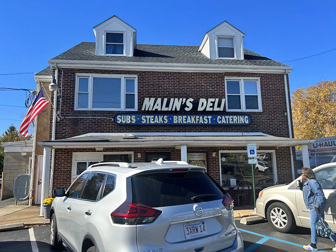 The brick-and-mortar promise of sandwich heaven &ndash; Malin's Deli stands proudly with its no-nonsense signage announcing the treasures within: SUBS &bull; STEAKS &bull; BREAKFAST &bull; CATERING.