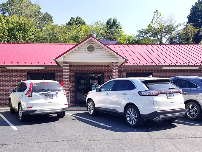 The unassuming brick exterior with its distinctive red roof houses barbecue treasures that would make even the most stoic Virginian weep with joy.
