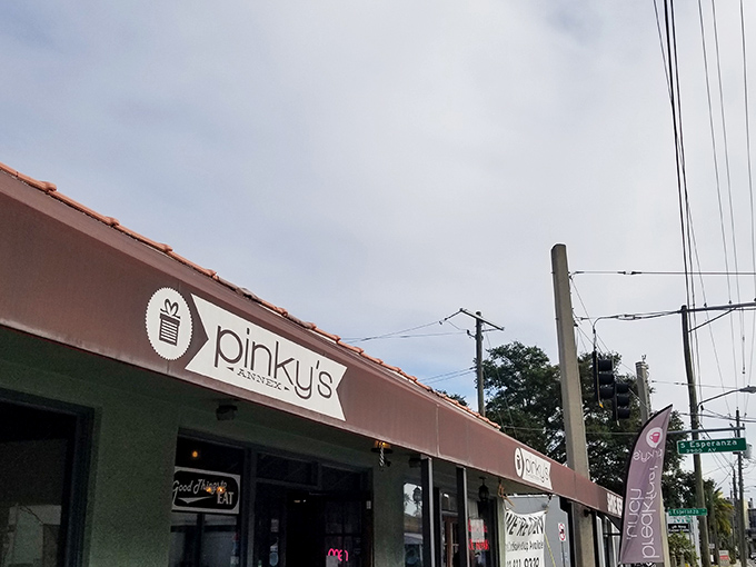 The unassuming pink storefront might not scream "culinary destination," but locals know this Tampa treasure is worth slamming on the brakes for.