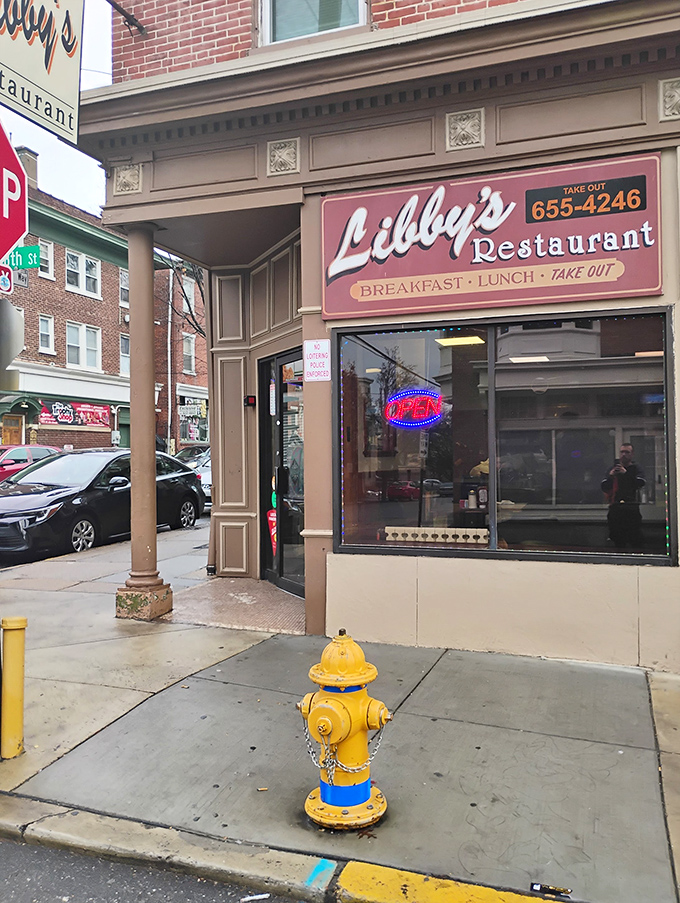 The unassuming storefront of Libby's Restaurant beckons with its classic signage and glowing "OPEN" sign—a breakfast beacon that's been drawing Wilmington locals for generations.