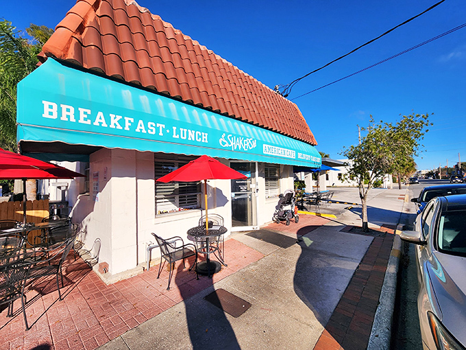The iconic teal awning and terracotta roof of Shakers American Caf&eacute; stands as a breakfast beacon in Orlando's College Park neighborhood. Florida sunshine included at no extra charge!