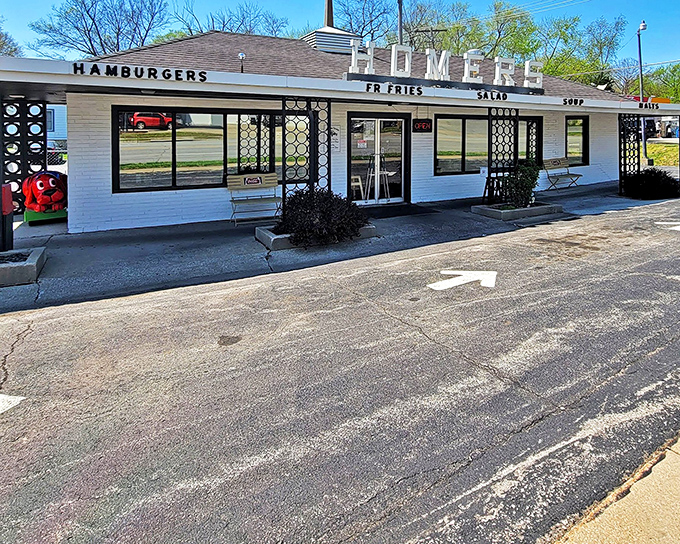 The classic diner beckons with its vintage signage proudly announcing "BEEF HAMBURGERS" – like a time portal to simpler, deliciously unpretentious days.