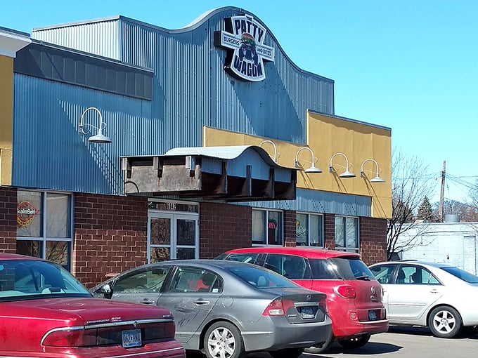 The yellow and gray exterior of The Patty Wagon stands like a beacon of comfort food hope in Minneapolis. No fancy frills, just delicious promises.