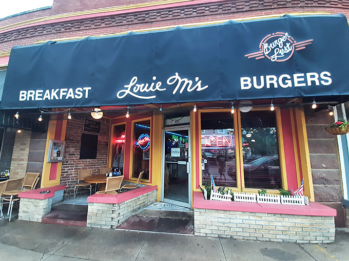 The unassuming storefront of Louie M's Burgerlust stands like a culinary lighthouse in South Omaha, promising breakfast and burgers with equal devotion.