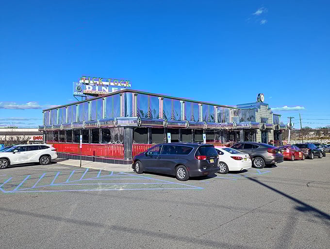 The iconic neon glow of Tick Tock Diner's sign promises 24-hour comfort in a chrome-wrapped package. New Jersey's answer to insomnia and hunger pangs.