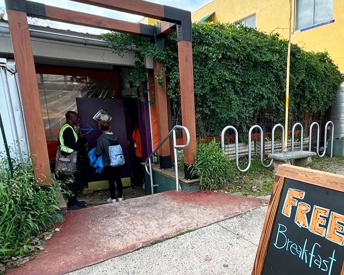 The iconic blue sign says it all &ndash; people aren't just waiting for breakfast, they're queuing for a culinary pilgrimage at Sunny Point Caf&eacute;.