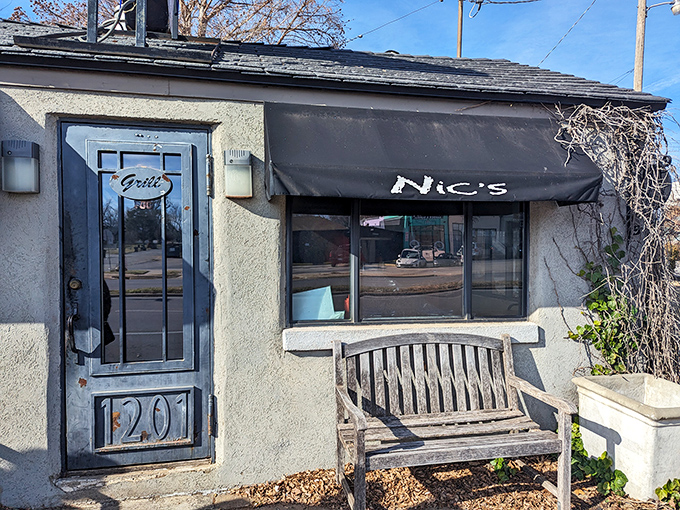 The humble exterior of Nic's Grill belies the culinary treasures within. This unassuming shack houses Oklahoma City's burger paradise.