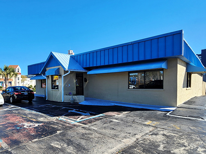 The unassuming blue-roofed exterior of Harry's might not scream "pancake paradise," but locals know better. Culinary treasures often hide in plain sight.
