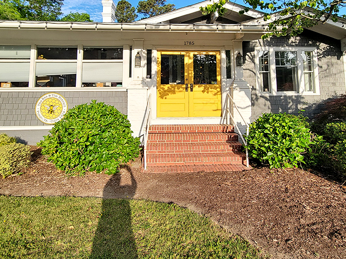 Those sunshine-yellow doors aren't just an entrance&mdash;they're a promise of the golden, buttery delights waiting inside this unassuming Pungo treasure.