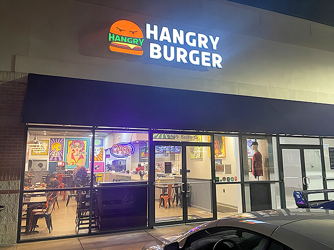 The beacon of burger bliss! Hangry Burger's illuminated storefront promises salvation for those teetering on the edge of hunger-induced crankiness.