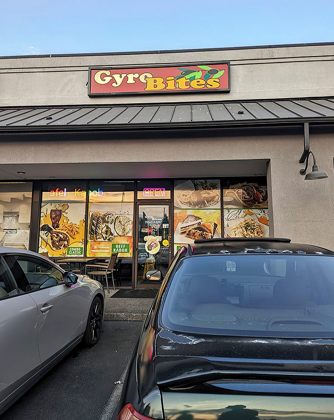 The colorful Gyro Bites sign beckons like a Mediterranean lighthouse in a sea of strip mall sameness. No pretension, just promise. 