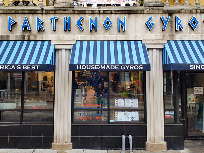 The iconic blue and white Parthenon Gyros storefront stands proudly on State Street, like a little slice of Santorini dropped into downtown Madison.