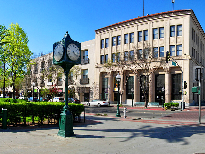 The historic El Capitan Hotel stands tall against California's endless blue sky, a testament to Merced's blend of affordability and architectural charm.