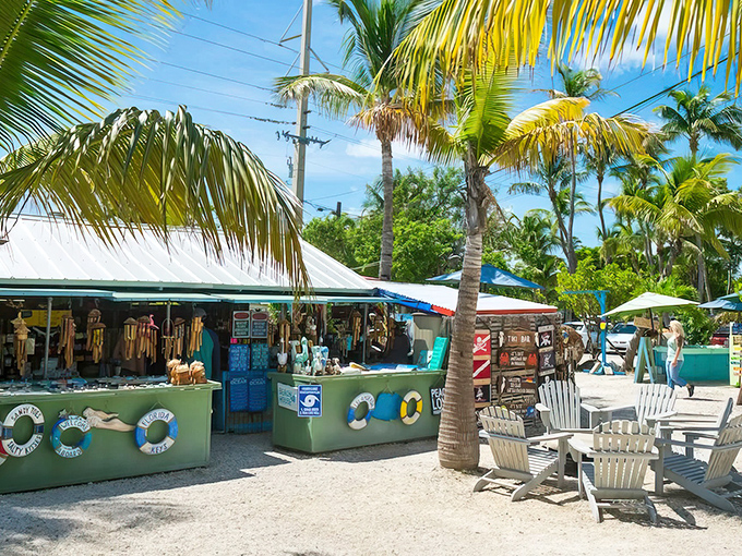 Colorful storefronts under swaying palms — the quintessential Keys experience where flip-flops are the dress code and relaxation is mandatory.