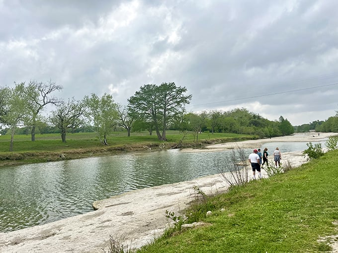 The Blanco River stretches out like nature's welcome mat, inviting visitors to dip their toes or dive right in. Texas hospitality in liquid form.