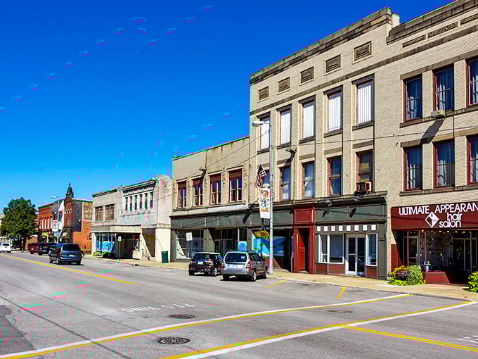 Main Avenue's historic buildings catch the golden hour sunlight, a scene that makes you wonder if Norman Rockwell moonlighted as a city planner.