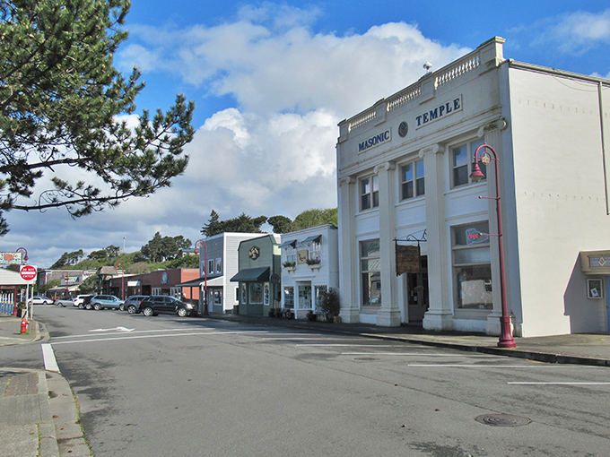 Old Town Bandon's main street looks like a movie set where the director actually bothered to research what small-town charm really means.