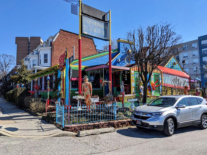The PaperMoon Diner stands out like a rainbow in a grayscale world, its vibrant exterior promising an experience that's anything but ordinary.