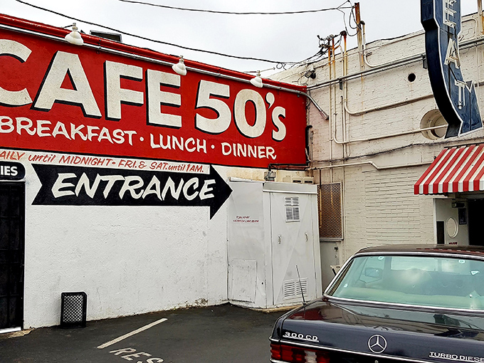 The iconic red and white striped fa&ccedil;ade of Cafe 50's beckons like a time portal on Santa Monica Boulevard. It's not just a meal&mdash;it's a journey.