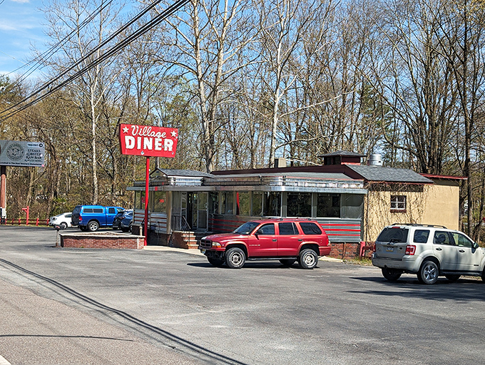 That iconic red sign against the blue Pennsylvania sky isn't just a diner marker &ndash; it's a beacon of hope for the breakfast-desperate traveler.