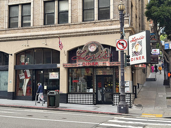 That iconic red neon sign beckons like a lighthouse for the hungry, promising a journey back to when dining was an event, not just a pit stop.