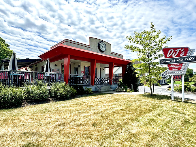 The classic red-roofed exterior of DJ's Taste of the 50's stands like a time machine in Lancaster, beckoning hungry travelers with its vintage charm and nostalgic signage.