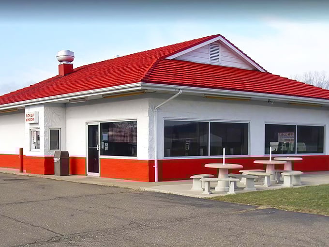 The iconic red-roofed building stands like a BBQ beacon, promising smoky delights to hungry travelers passing through Nashport.
