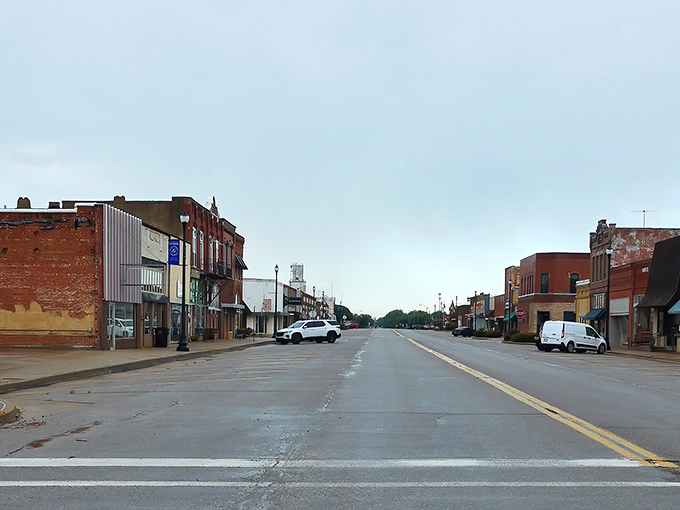Historic brick buildings stand sentinel on Watonga's Main Street, their weathered facades telling stories of generations who've called this affordable haven home.