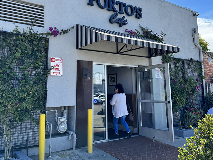Porto's outdoor seating area offers the perfect stage for people-watching while debating which pastry deserves your undivided attention next.