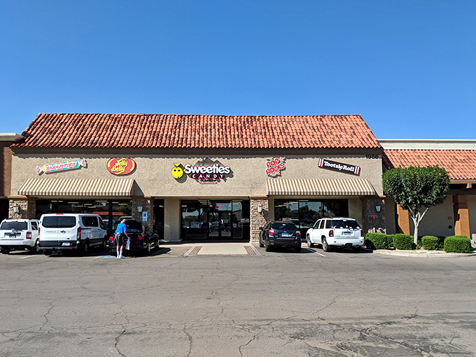 The smiley face logo says it all&mdash;this isn't just a candy store, it's therapy with a sugar rush guarantee.