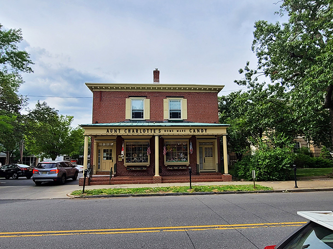 The brick facade of Aunt Charlotte's stands like a sweet sentinel of simpler times, promising confectionery magic behind those welcoming doors.