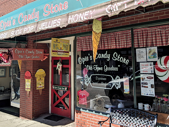 The storefront that launched a thousand sugar rushes! Opie's Candy Store beckons with its charming fa&ccedil;ade and promise of "Old Time Goodies" in downtown Mount Airy.