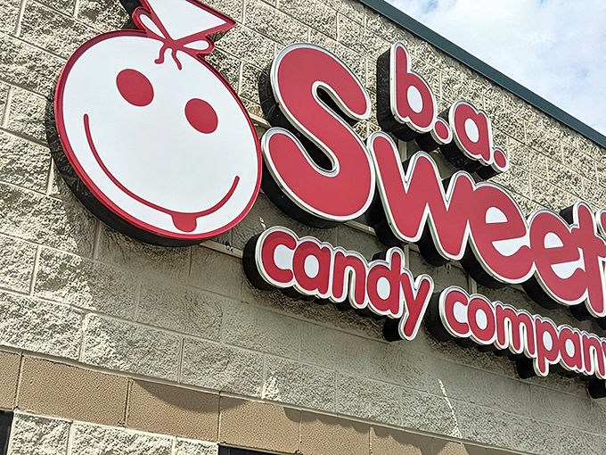 The cherry-topped sign beckons like a lighthouse for sugar enthusiasts. Sweeties Candy Company stands ready to fulfill childhood dreams in Cleveland.