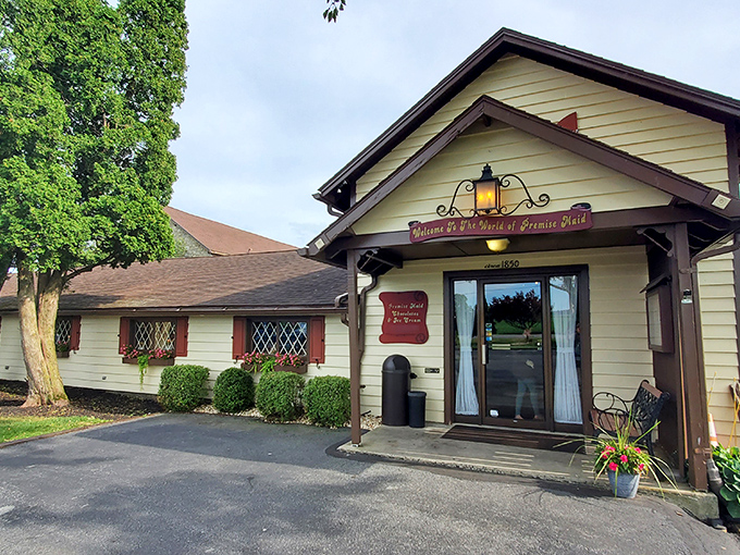 The charming Tudor-style facade of Premise Maid beckons like a fairytale cottage where calories don't count and chocolate dreams come true.