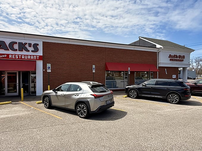 The iconic red awning of Jack's Deli beckons like a culinary lighthouse, promising comfort food that transcends trends and satisfies souls.
