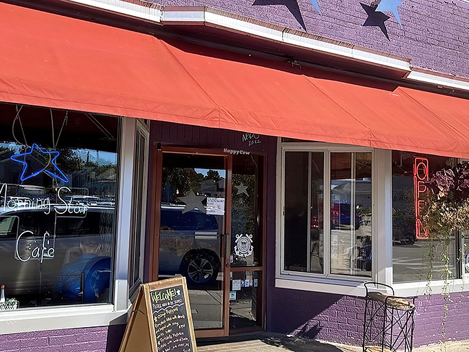 The purple facade with its cheerful red awning and hanging flower baskets isn't just eye-catching&mdash;it's nature's way of saying "breakfast is served!"