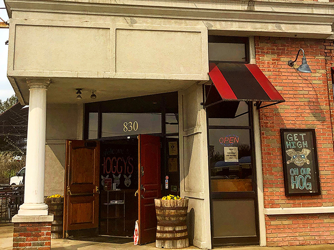 The red door at Hoggy's BBQ isn't just an entrance&mdash;it's a portal to smoke-kissed nirvana that Columbus locals have treasured for years.