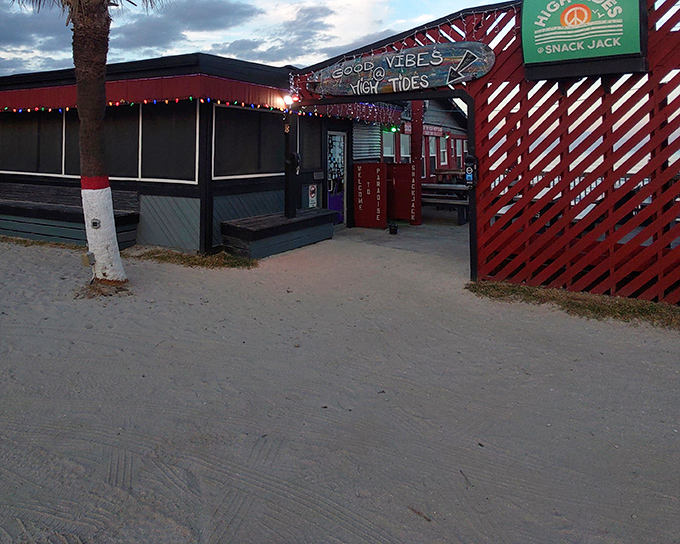 Where the sand meets your shoes before it meets your seat. Florida beach dining doesn't get more authentic than this red and turquoise gem.