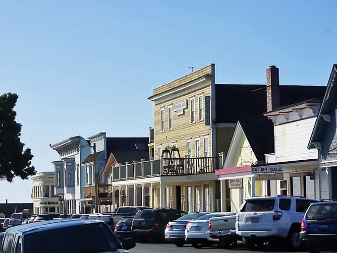 Sunset paints Mendocino's Victorian architecture in golden hues, transforming the coastal town into what looks like the world's most perfect movie set.