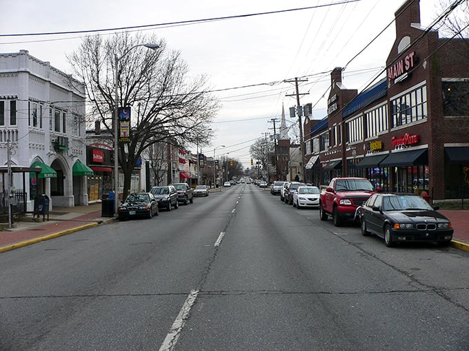 Main Street stretches before you like a small-town movie set, where local shops and eateries promise discoveries that chain stores simply can't deliver.