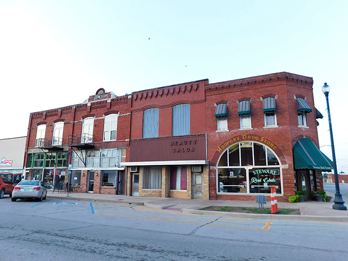 Historic brick buildings stand sentinel on Watonga's Main Street, their weathered facades telling stories of generations who've called this affordable haven home.