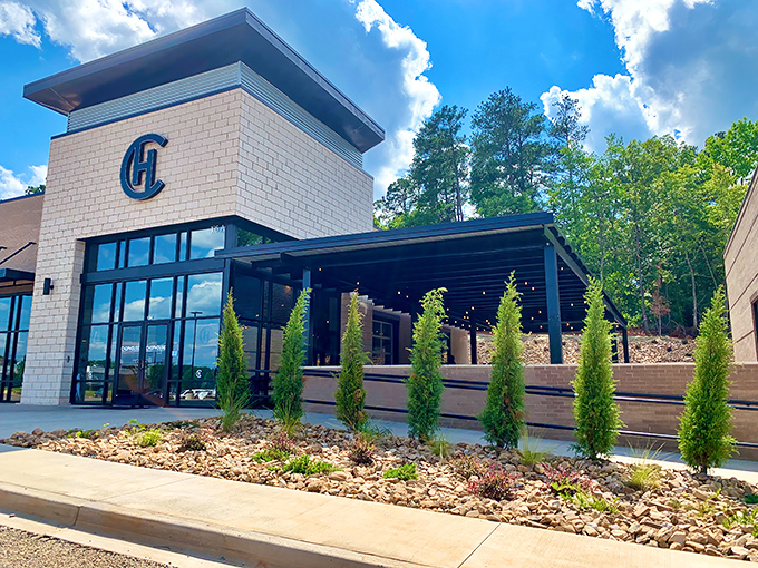 Modern elegance meets small-town charm at Chophouse of Chapin's striking exterior. That signature "CH" logo isn't just branding&mdash;it's a promise of excellence.