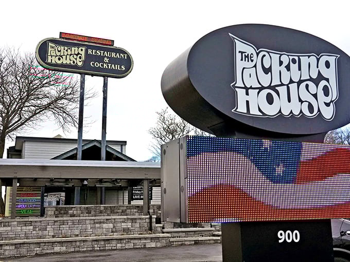 The iconic Packing House sign stands as a beacon for fish fry pilgrims, promising Milwaukee's favorite Friday tradition in neon-lit glory.