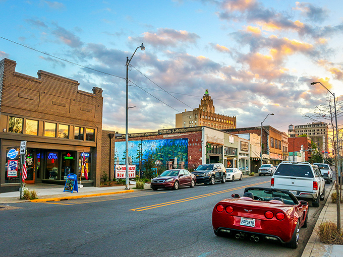 Monroe's skyline at sunset reflects in the Ouachita River like nature's own Instagram filter, showcasing the perfect blend of urban charm and natural beauty.